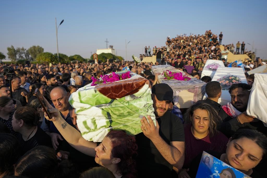 Iraq's prime minister visits wedding fire victims as 2 more people die ...