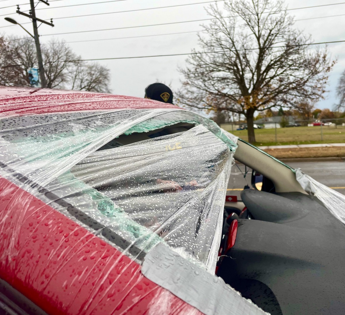 Driver uses plastic wrap as windshield replacement, charged with unsafe ...