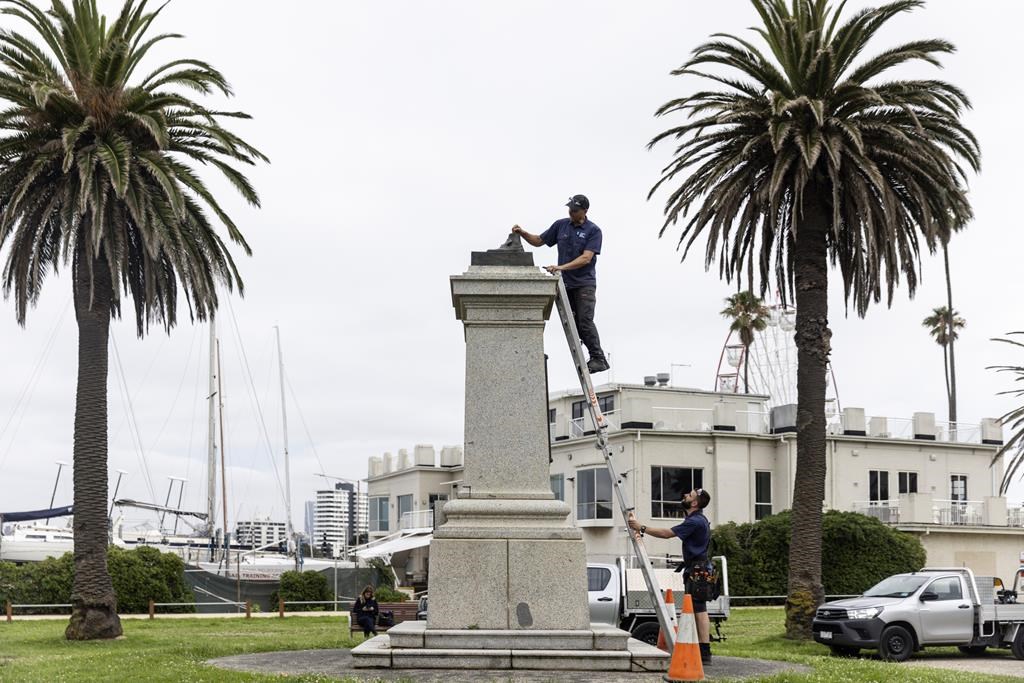 2 monuments symbolizing Australia's colonial past damaged by protesters ...