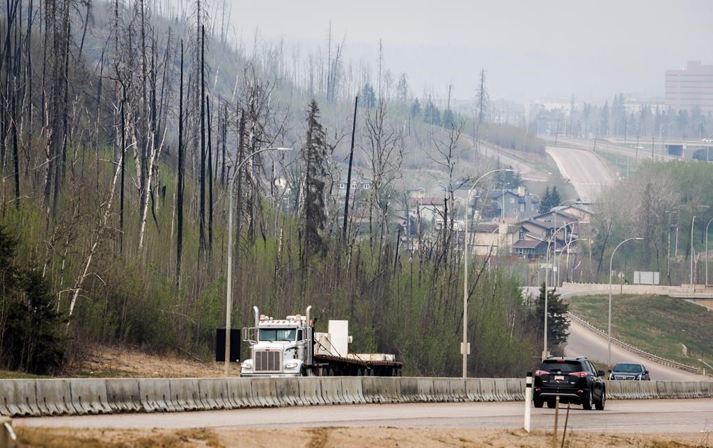The latest news on wildfires in Canada as thousands forced from homes ...