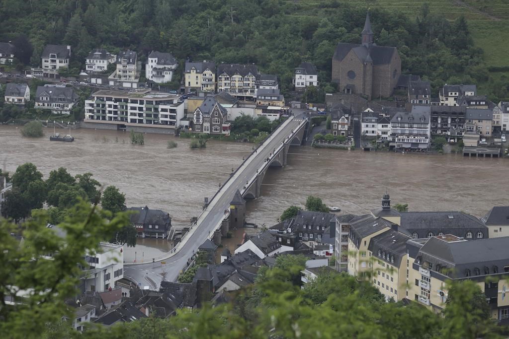 The German chancellor tours flooded regions in the southwest in a show ...