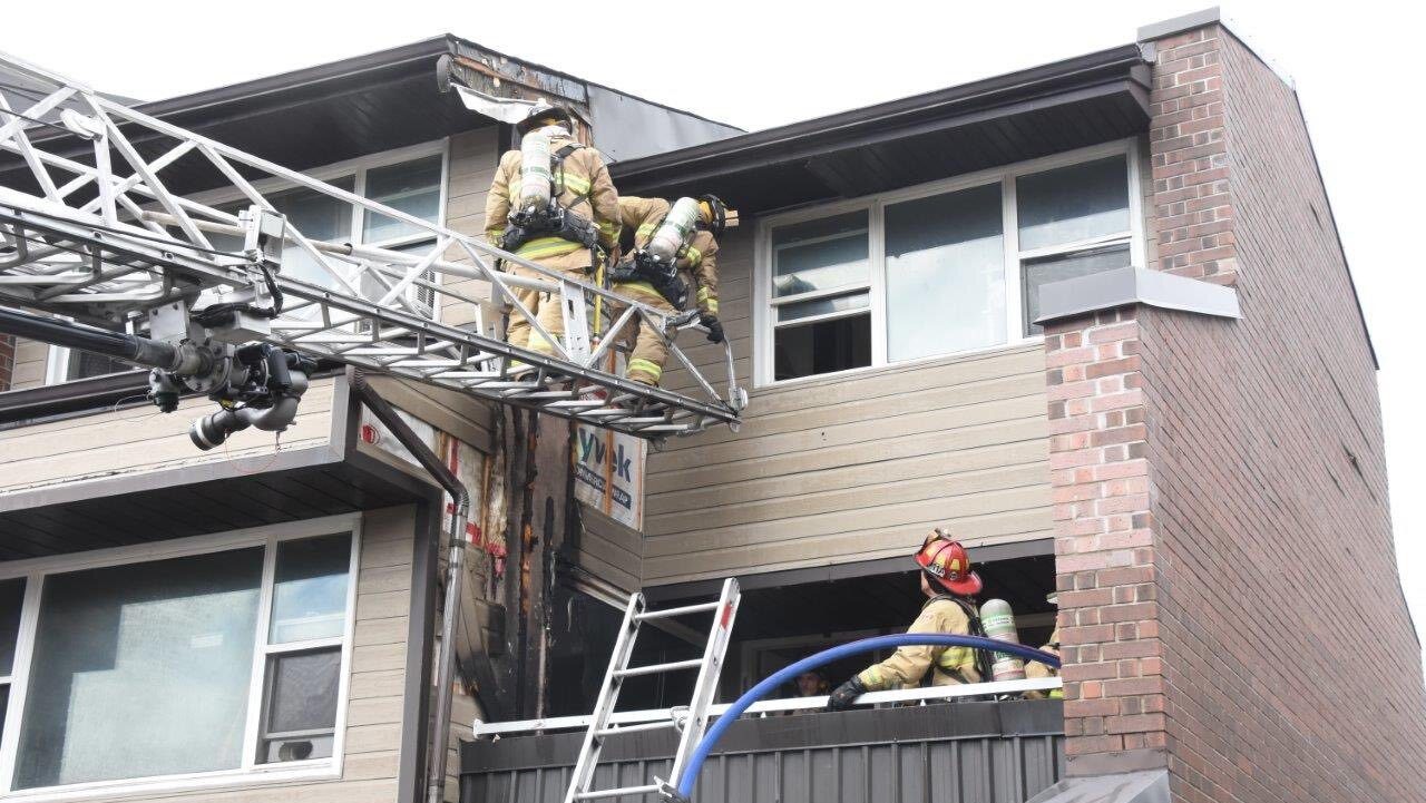 Firefighters kept busy with a balcony blaze, multi-unit building alarm