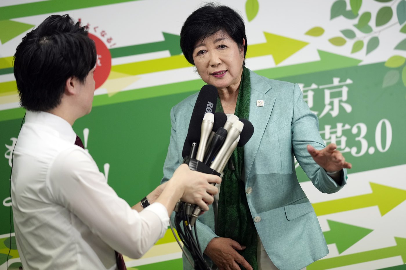 Tokyo Gov. Koike wins a third four-year term as head of Japan's ...