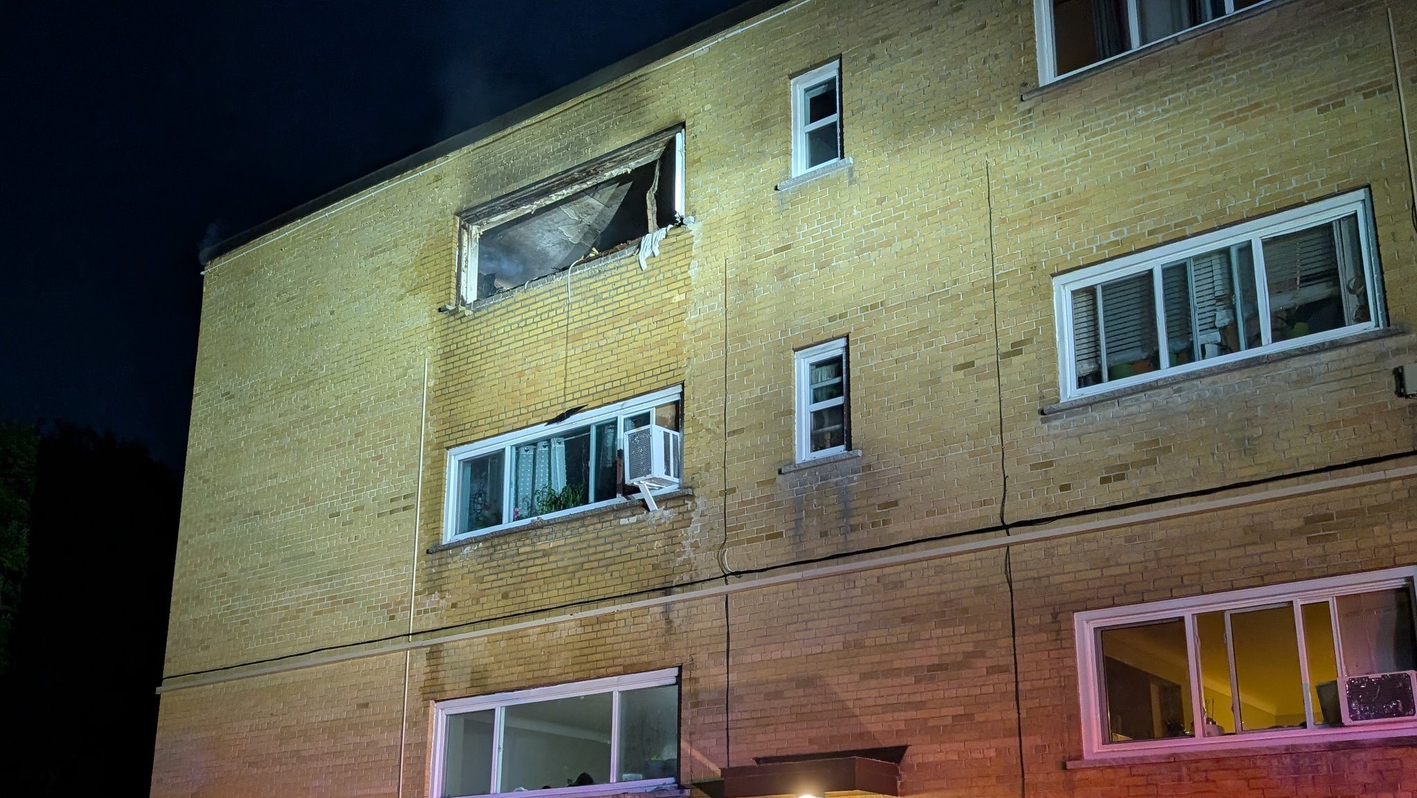 Woman charged with arson-related offences after window explosion