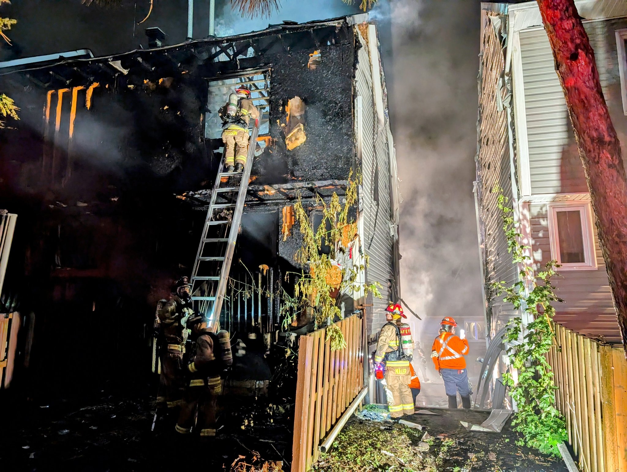 Woman jumped from window as flames engulfed south end townhomes