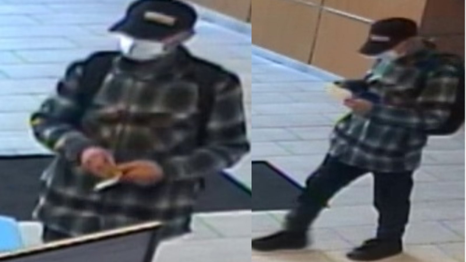 Man holds up sign demanding cash in downtown bank robbery