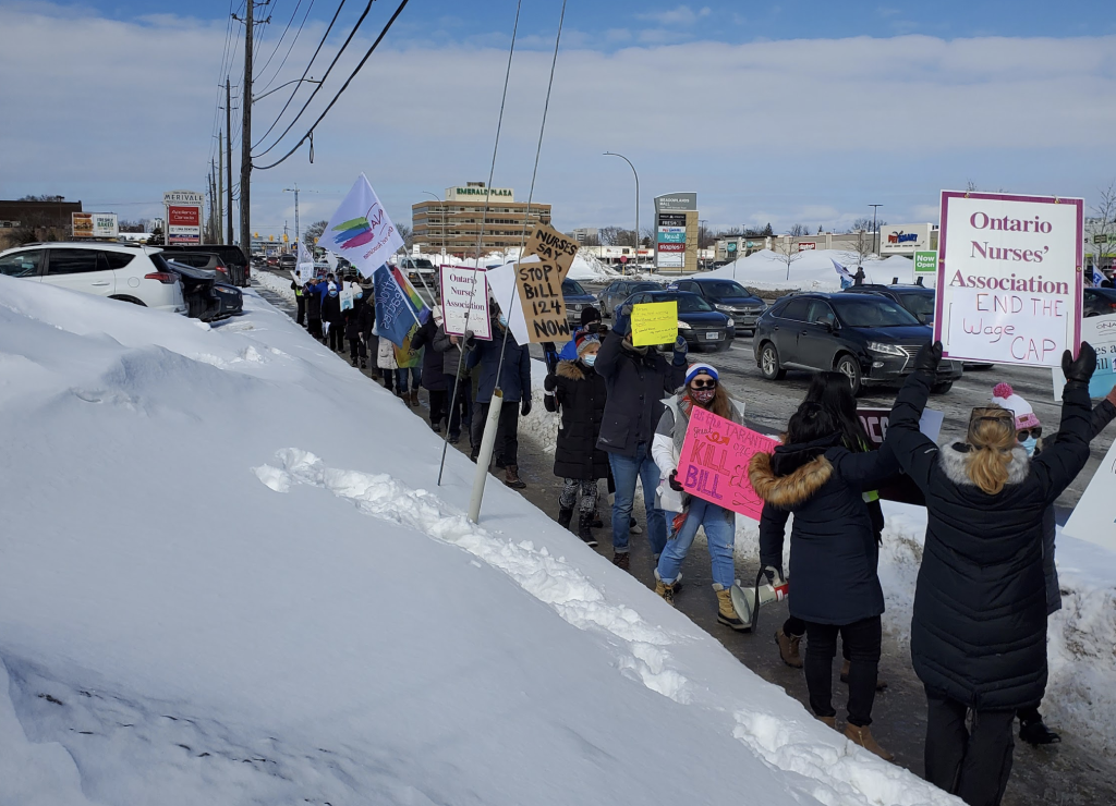 Local nurses, healthcare workers protest 'unfair wage cut law' Bill 124