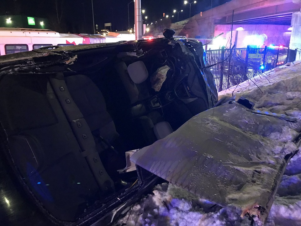 Car drives off 417 overpass, lands on Carling Avenue